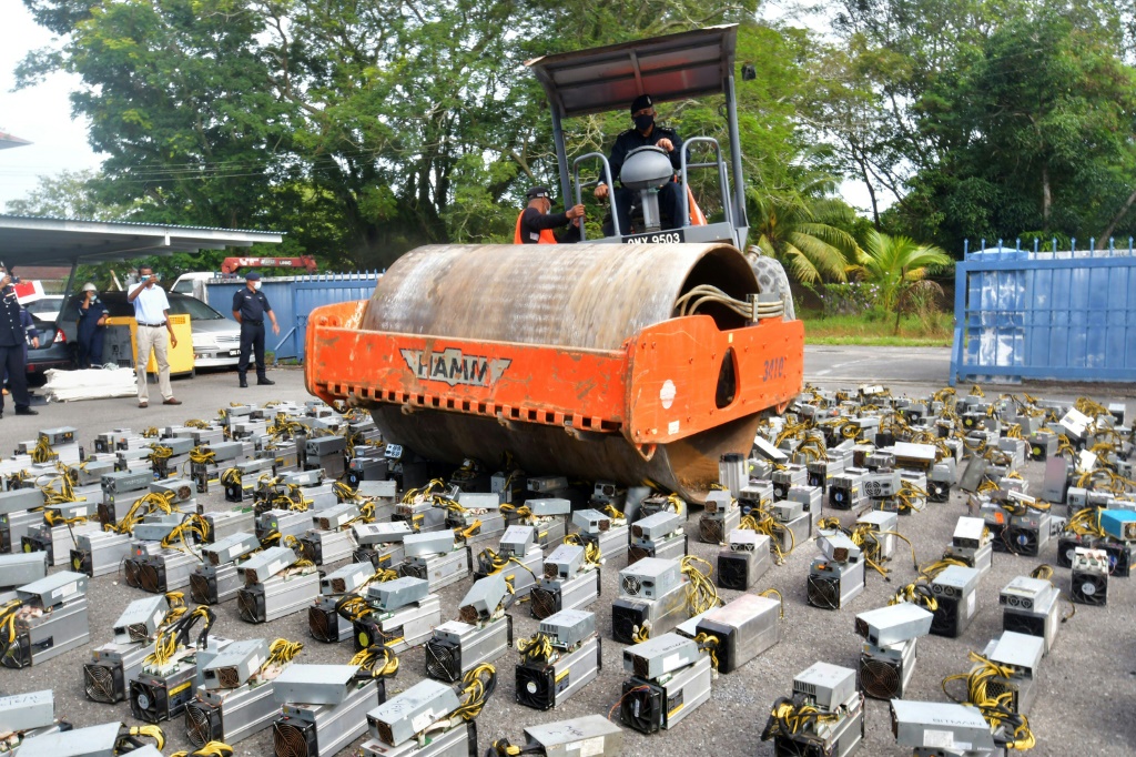 Malaysia cops steamroll 1K Bitcoin mining rigs | The Phnom Penh Post